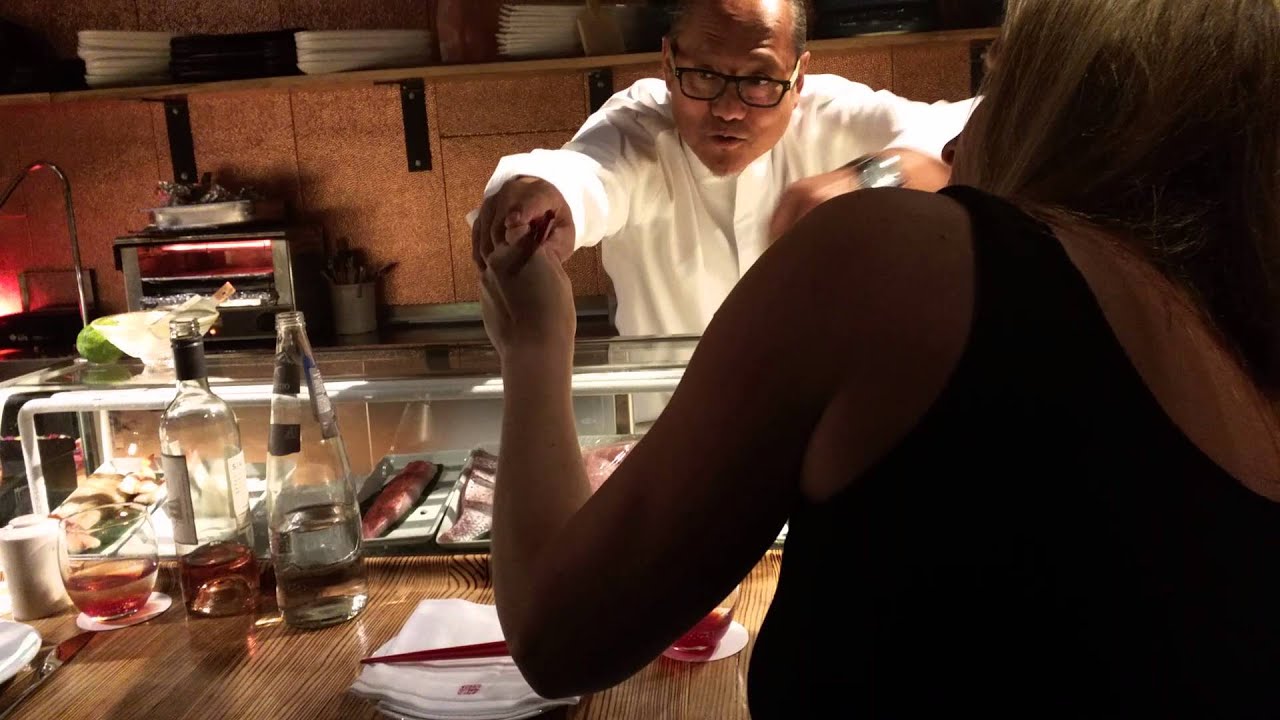 Iron Chef Morimoto teaching my wife to use Chopsticks at Morimoto Asia ...
