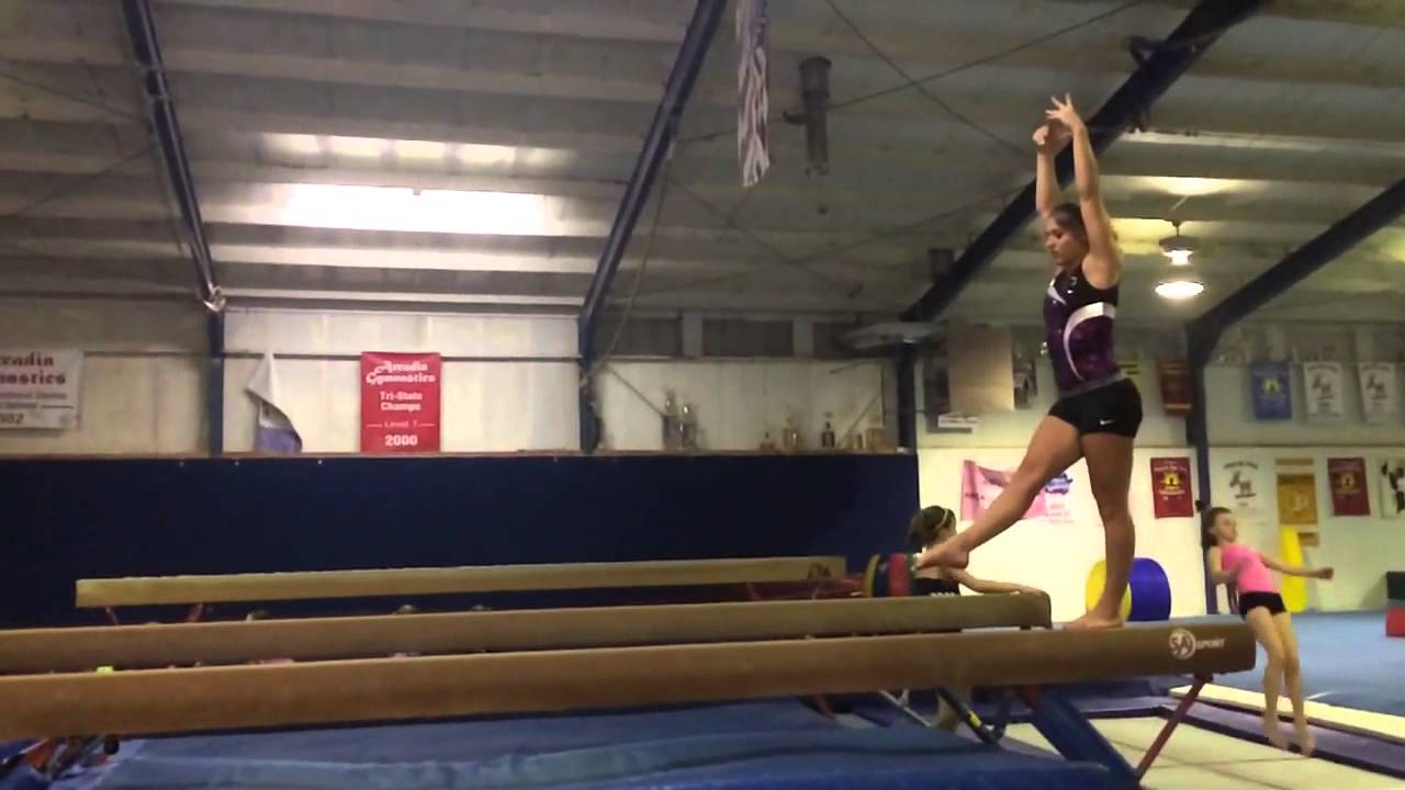Shantel Springer front toss on beam - YouTube