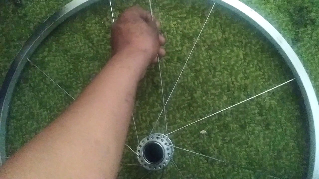 Como instalar los rayos a un rim de 36 hoyitos #2 - YouTube