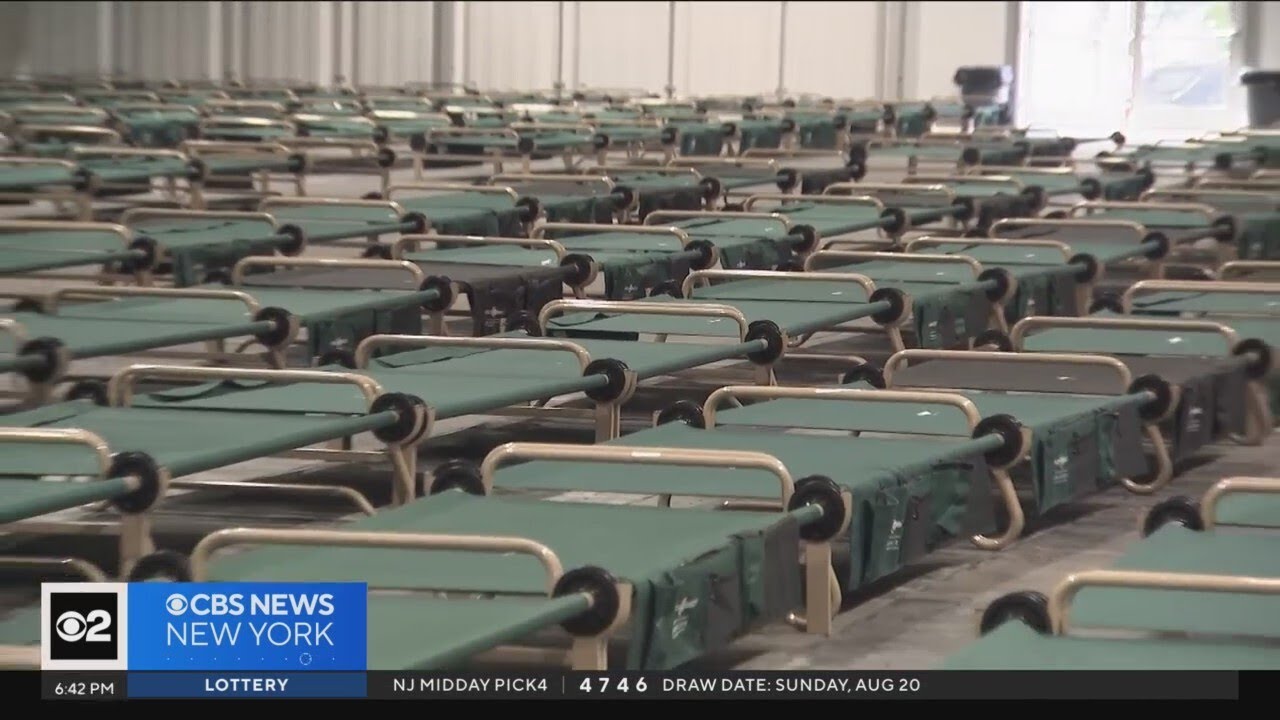 CBS New York tours asylum seekers facility on Randall's Island - YouTube