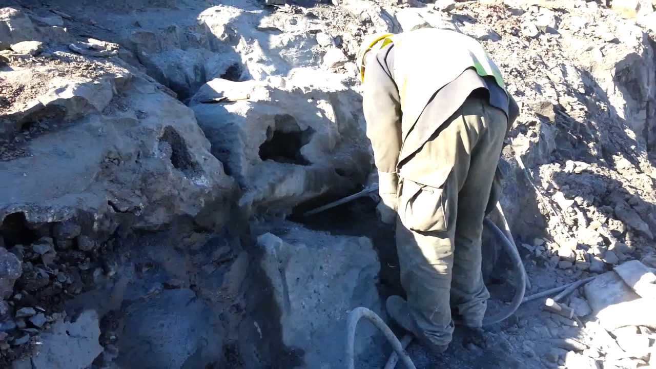 Cutting Amethyst Geode from Basalt - YouTube