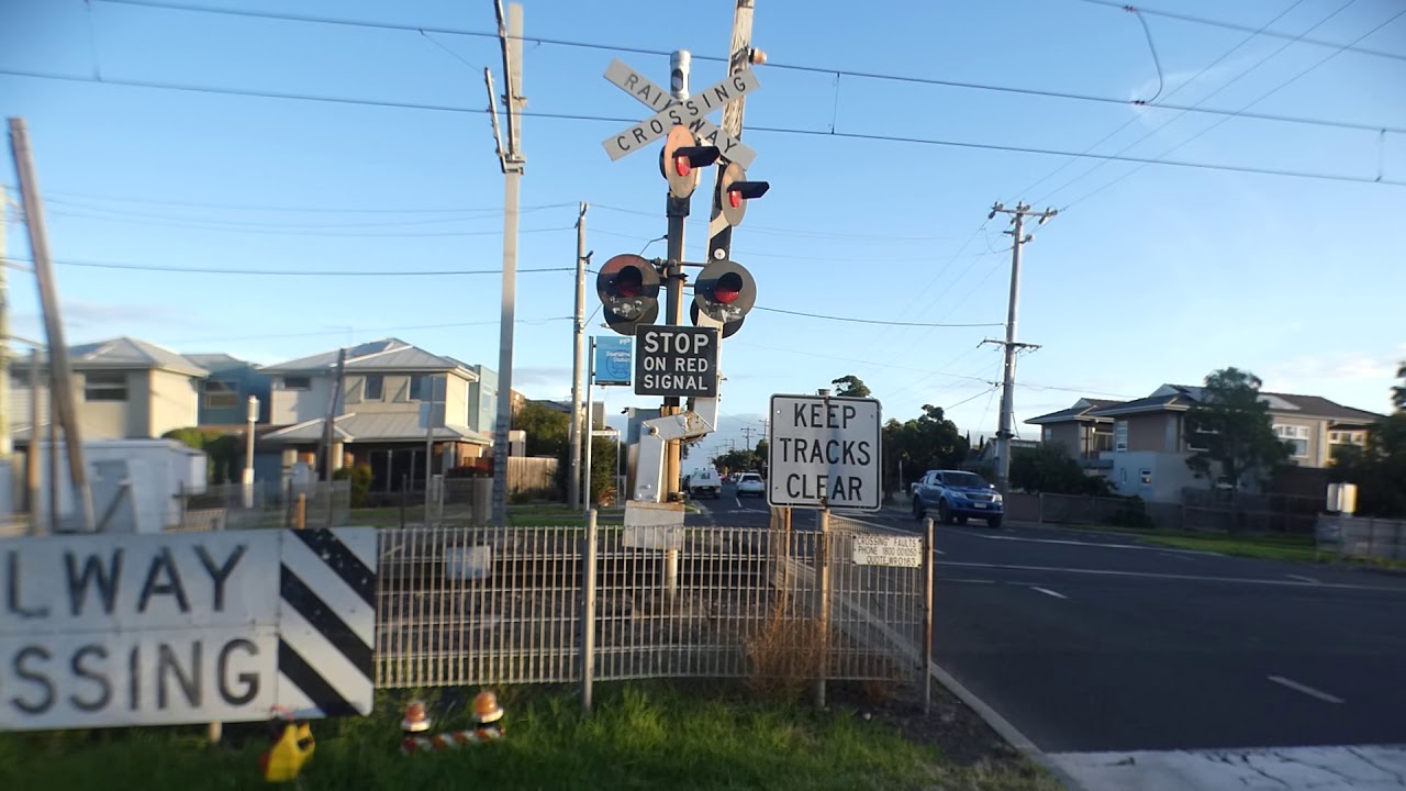 Seaholme Railway Crossing with the Rare Black And White Boomgates Video ...