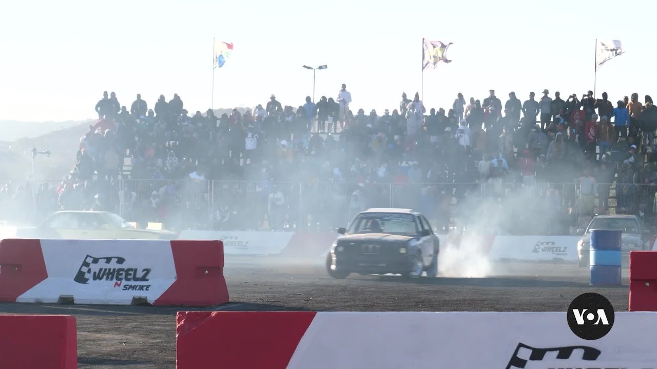 New sports minister promotes South African car 'spinning' - YouTube