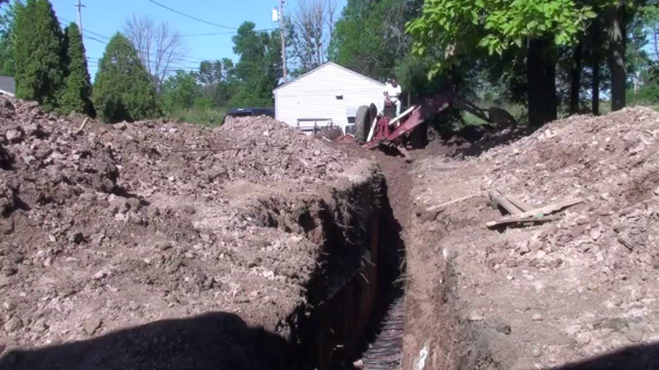 Geothermal , Filling in the last trench - YouTube