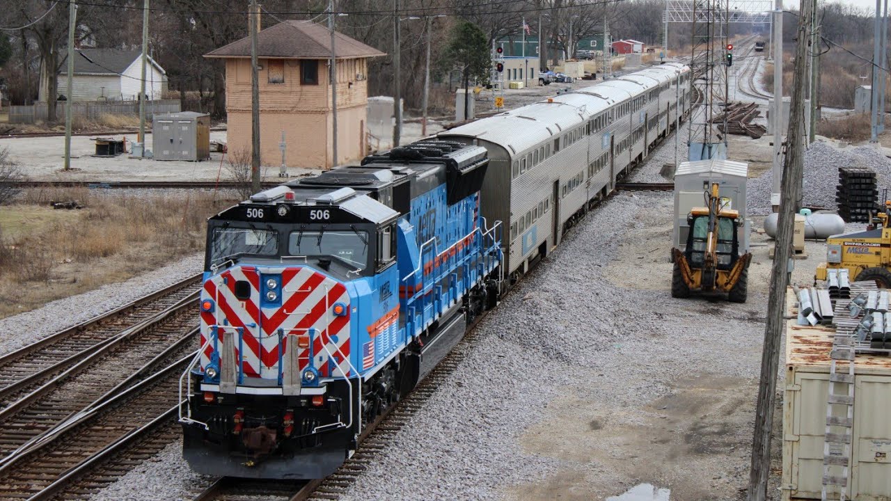 Metra cab-car 8516 east with SD70MACH 506 at Rondout, Illinois on March ...