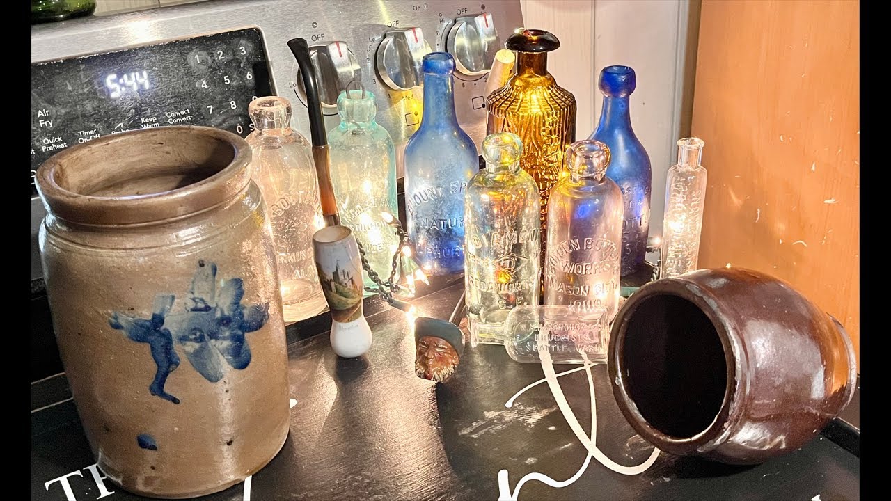 Live Auction Cobalt blobs, marbles, hutches, stoneware, face pipe ...