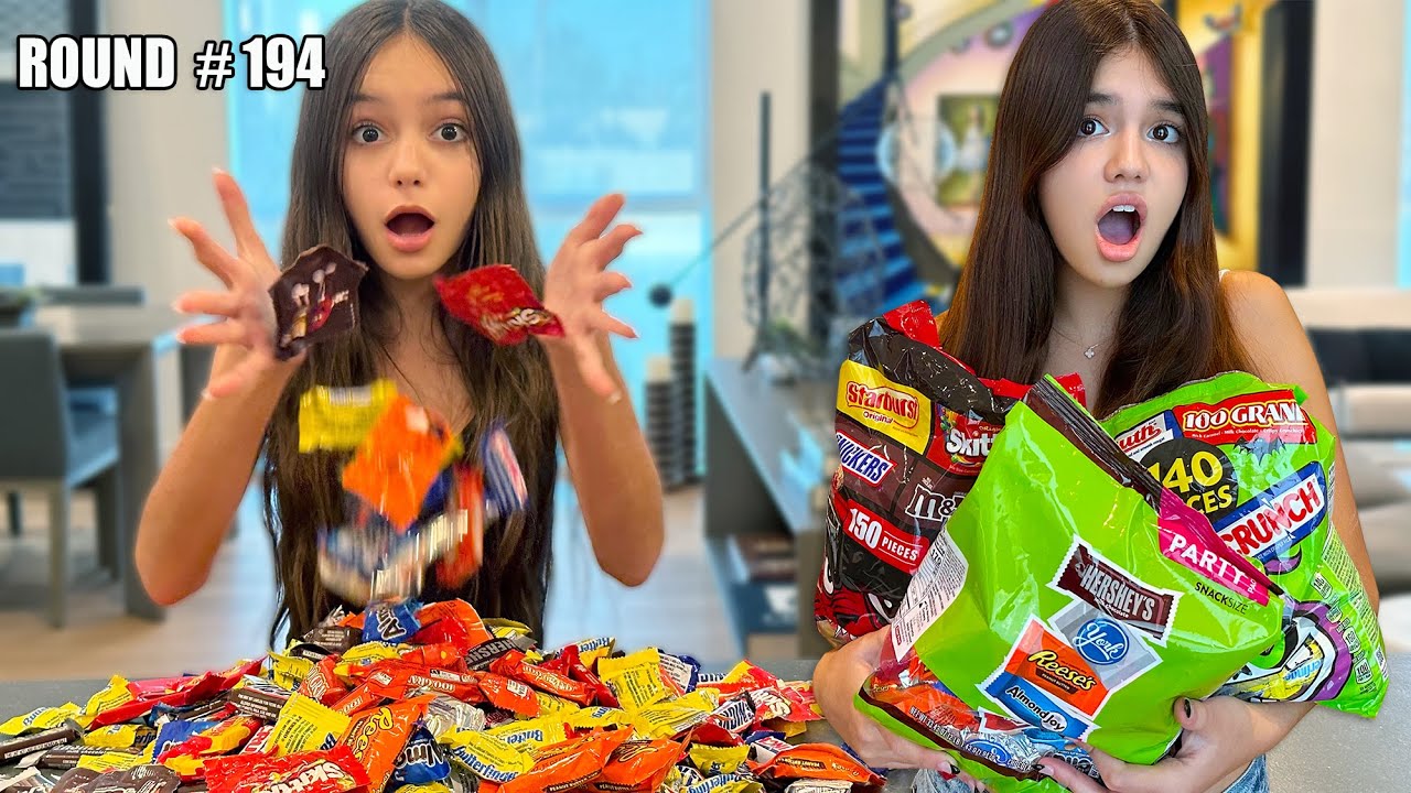 LAST TO STOP EATING HALLOWEEN CANDY! | Emily and Evelyn - YouTube