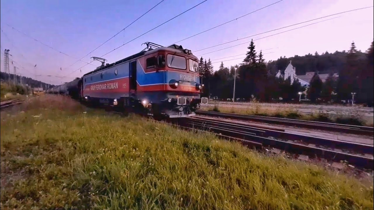 Train loaded 2000 tons. Electric traction. Powerful locomotive . Trains ...