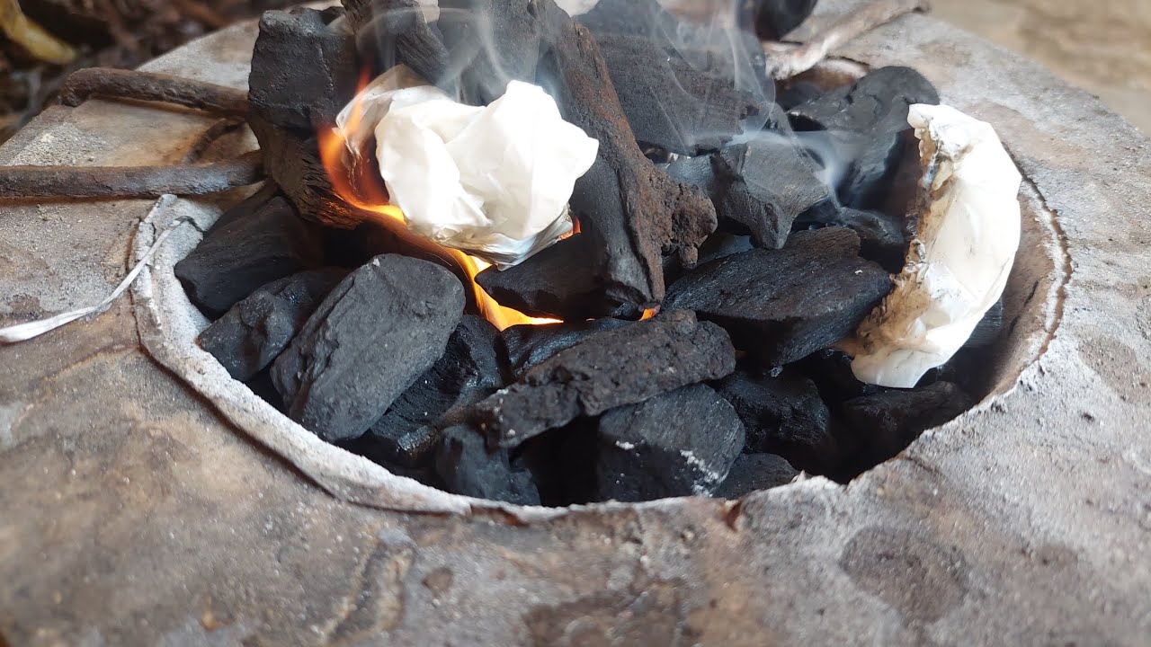 SIMPLE AND FAST WAY TO LIGHT YOUR CHARCOAL JIKO - YouTube