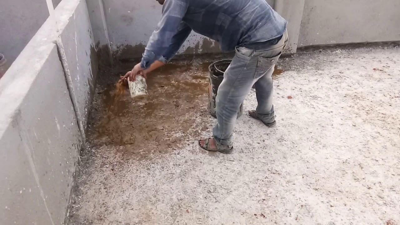 Spraying the kadukan and vellam after 15days to the weathering course ...