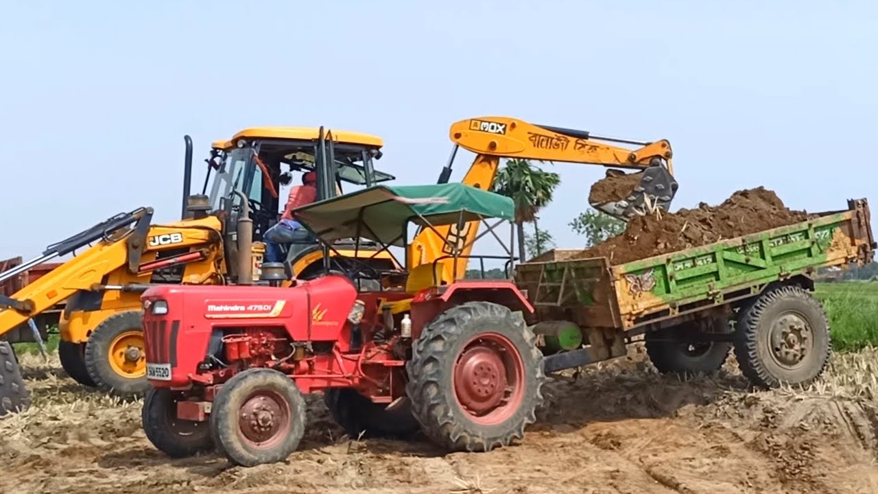 New Jcb 3dx Backhoe Loader Machine Loading Red Mud In Mahindra 475 DI ...