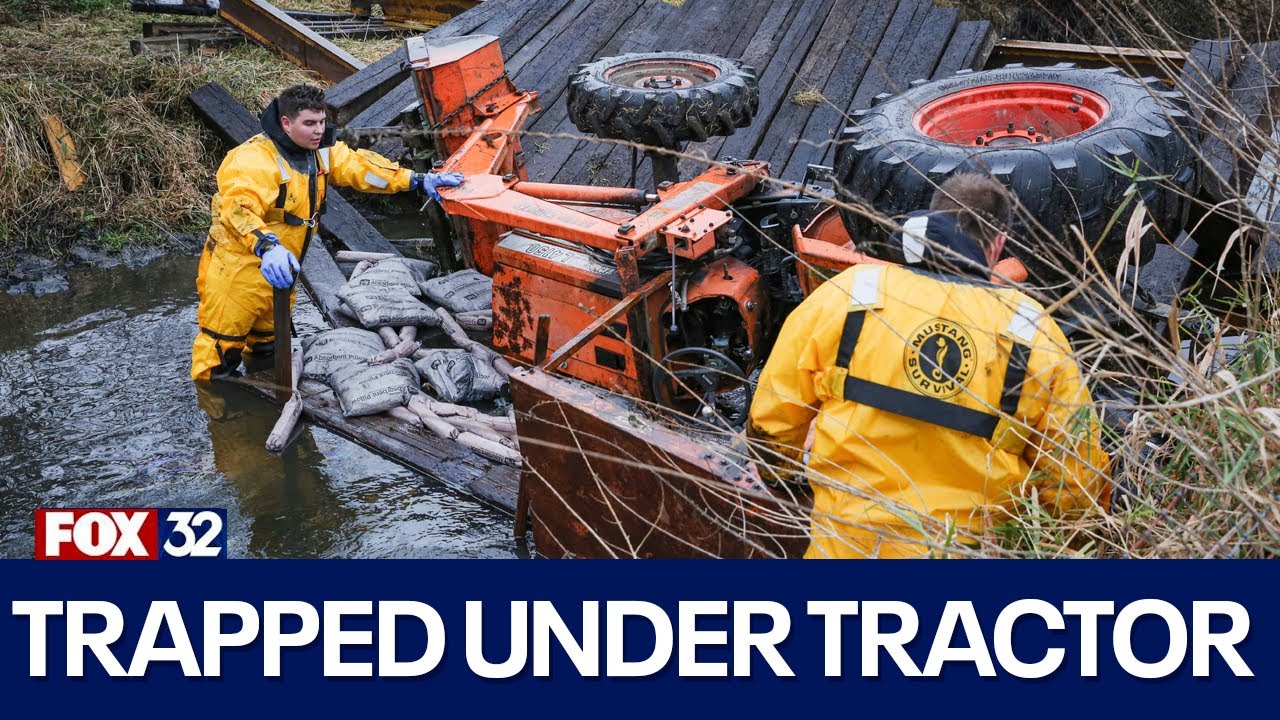 Man in serious condition after being trapped under tractor in Woodstock ...