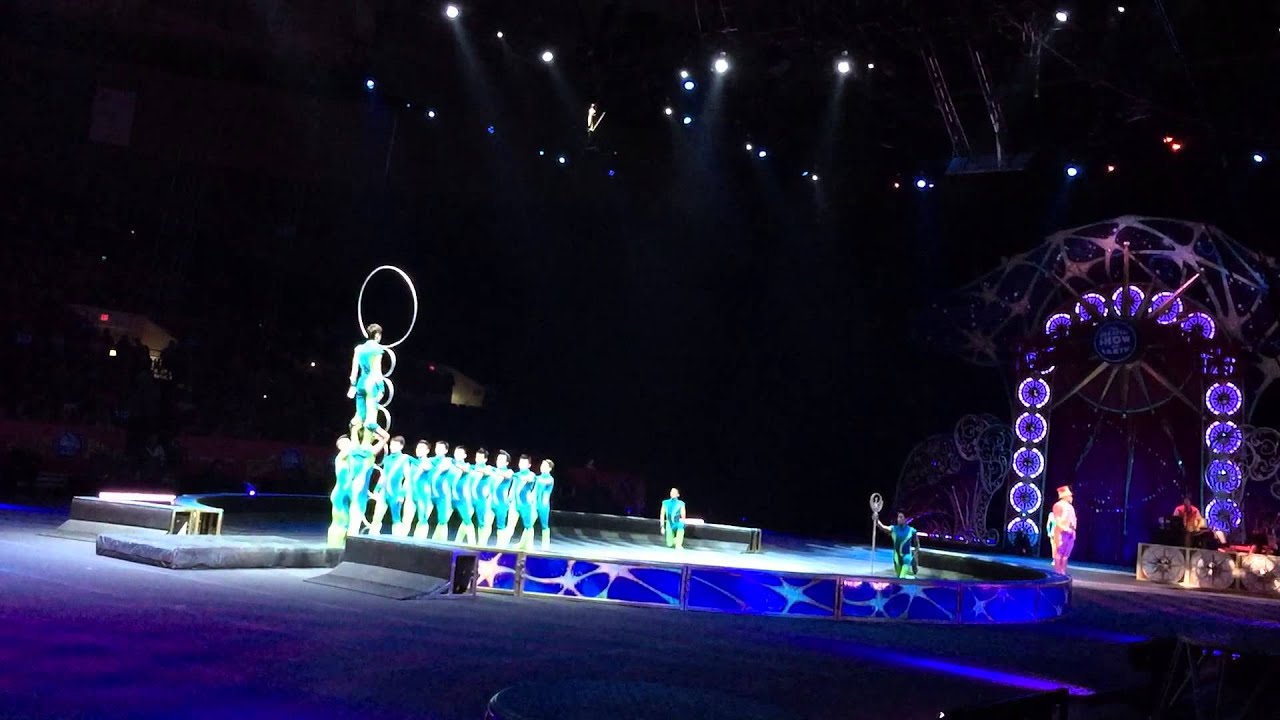 Ringling.bros crazy acrobat guy ten feet high hoop diving… - YouTube