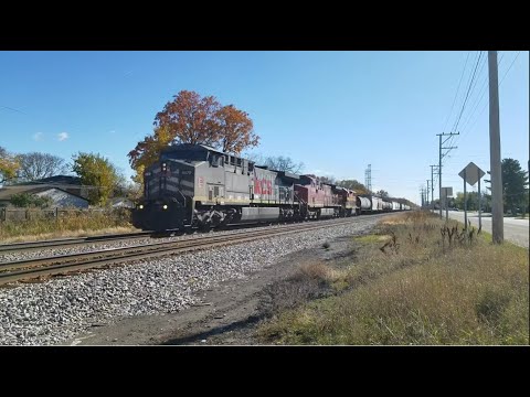 KCSM 4570 (gray) leads CPKC 247 with KCS GP38 trailing at Morton Grove - YouTube