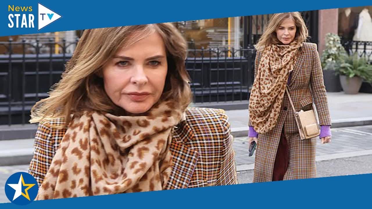 Trinny Woodall nails winter chic in orange check coat and leopard print ...