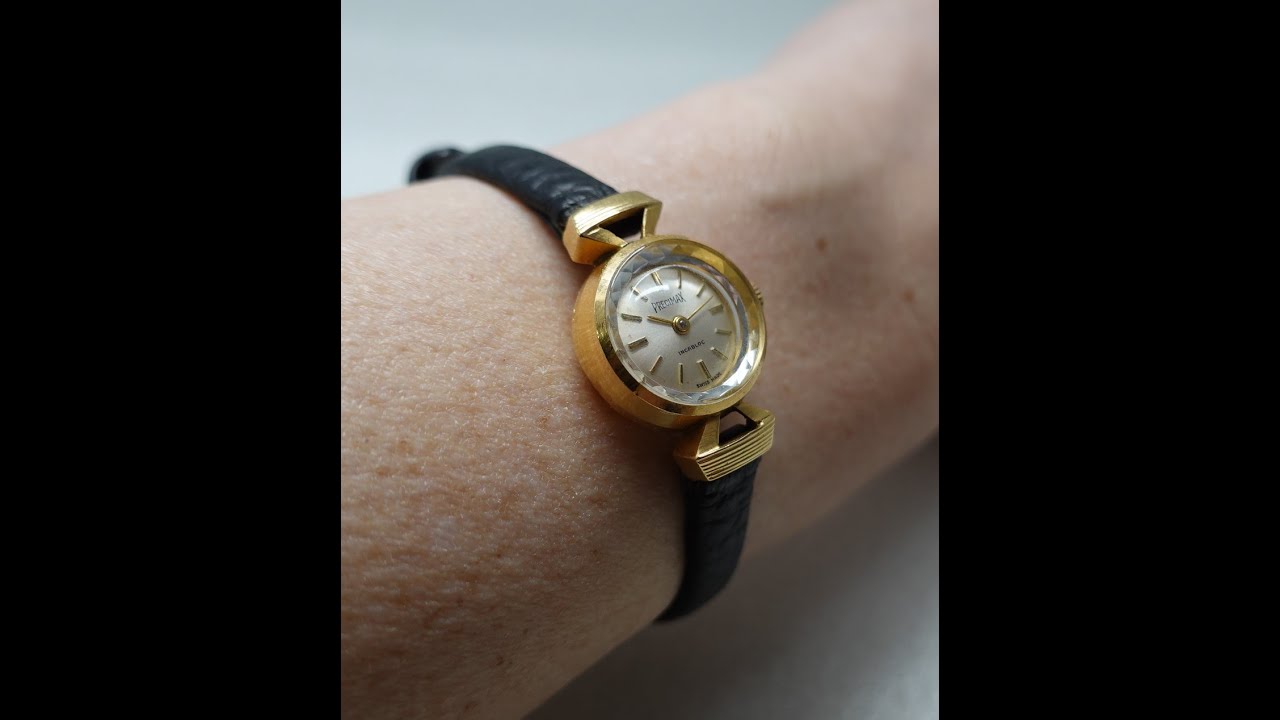 1972 Ladies Precimax 18k Gold cocktail watch with bow case. - YouTube