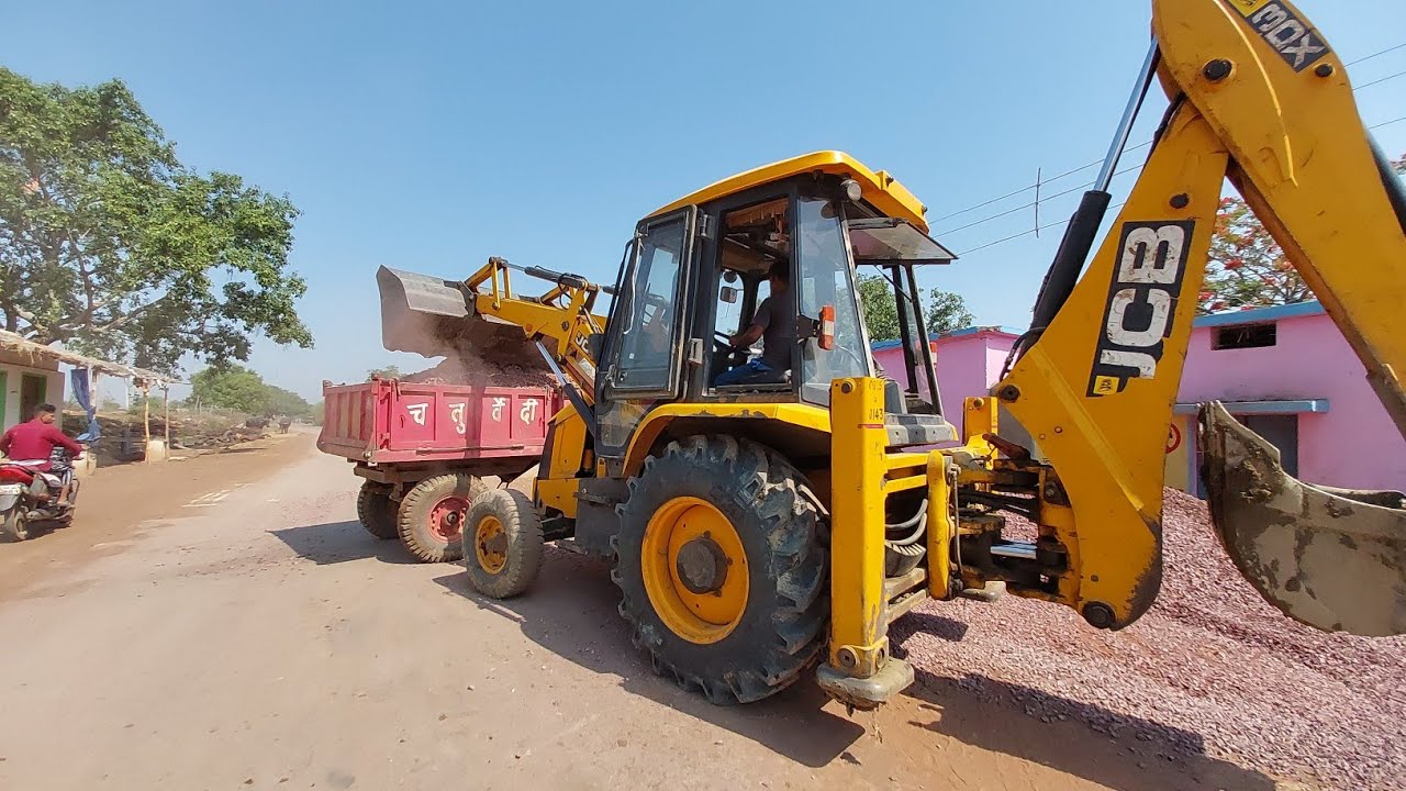 Jcb 3dx Backhoe Loading Grit In Mahindra Arjun Nova Tractor | Tractor ...