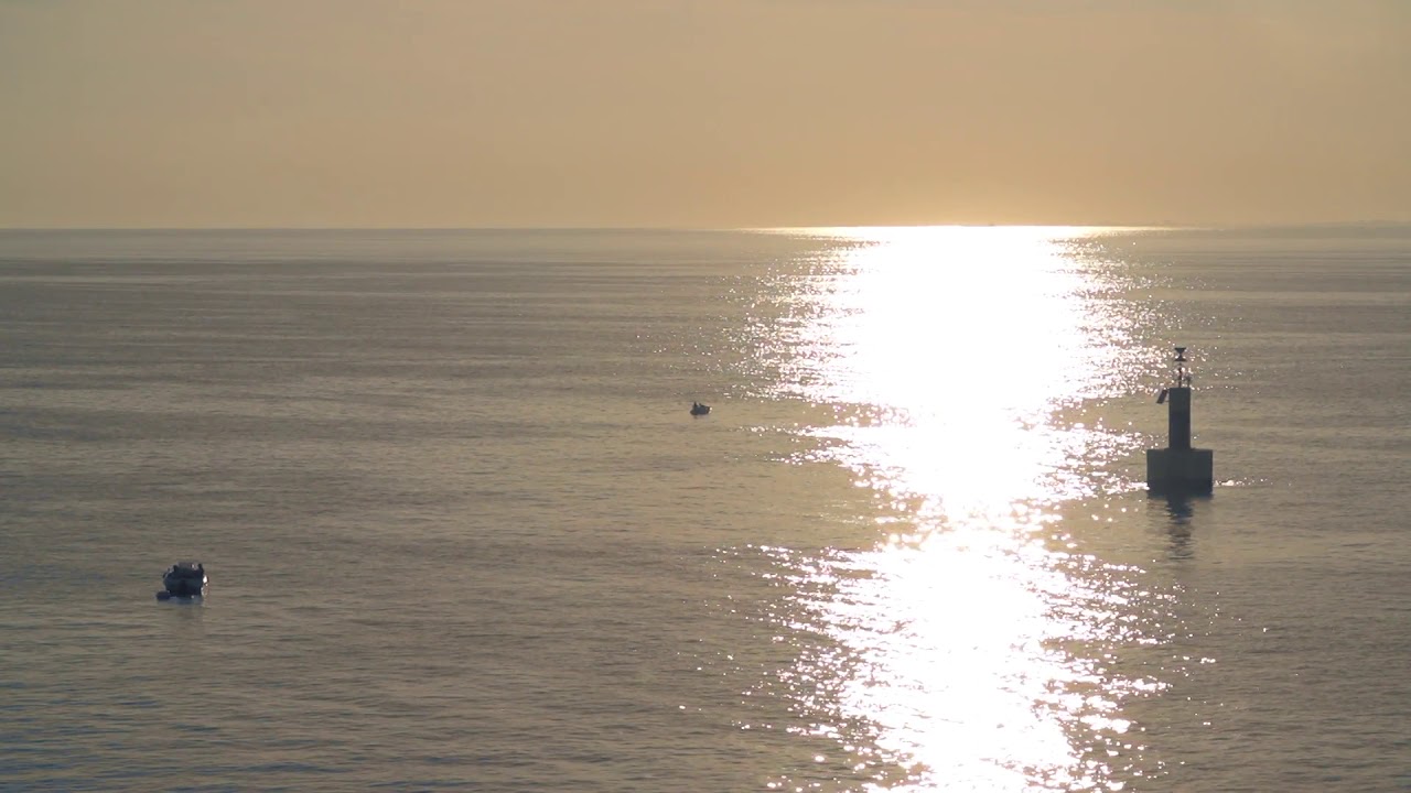 amazing golden sunlight gleaming over the sea - YouTube