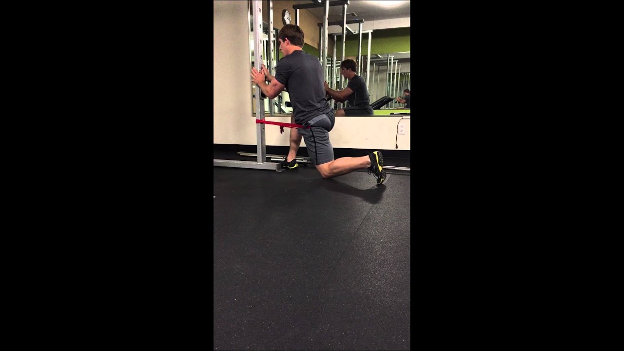 Strap assisted hip anterior glide in hip extension self mobilization ...