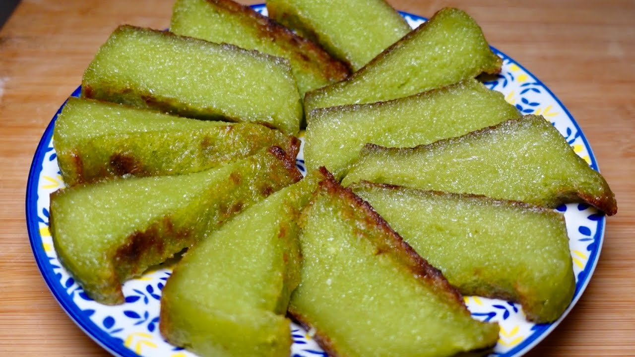 古早味斑斓木薯糕，Q弹爽口，斑斓椰浆味浓郁，层次分明，焦香的外皮非常的好吃😋The ancient pandan tapioca cake ...