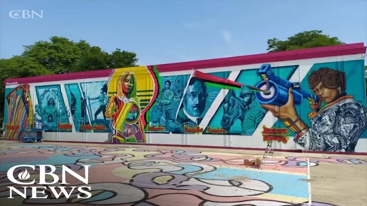 Artist Reginald Adams' Murals Honor Juneteenth in Major US Cities - YouTube