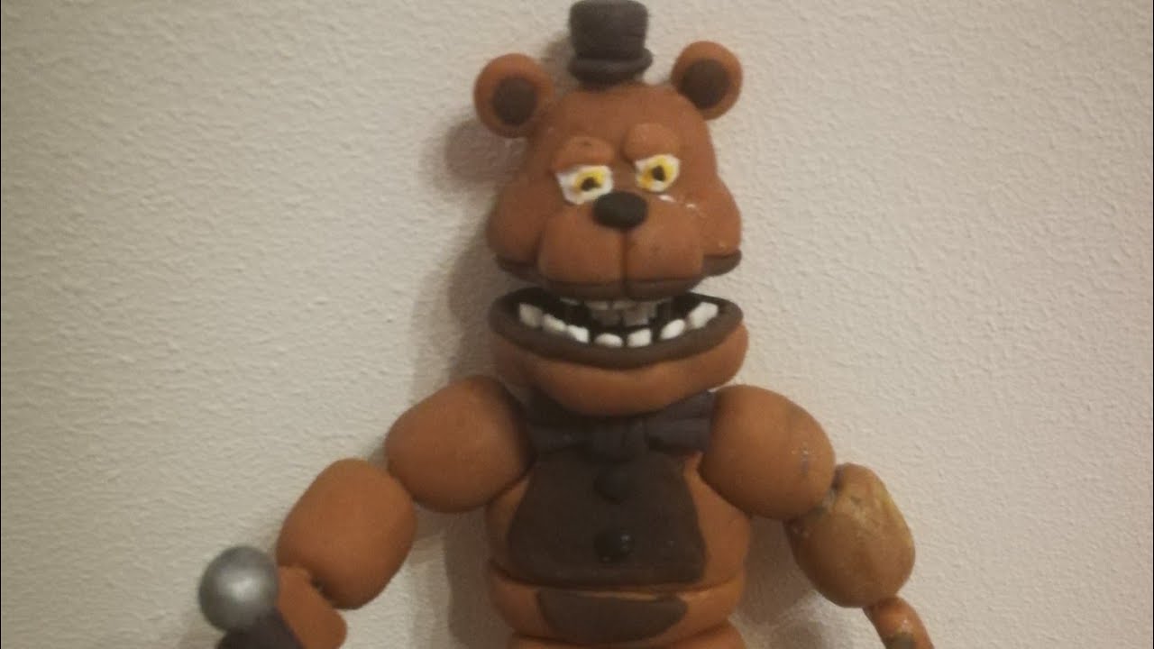 Making Fredbear just before the bite of 83 in polymer clay - YouTube