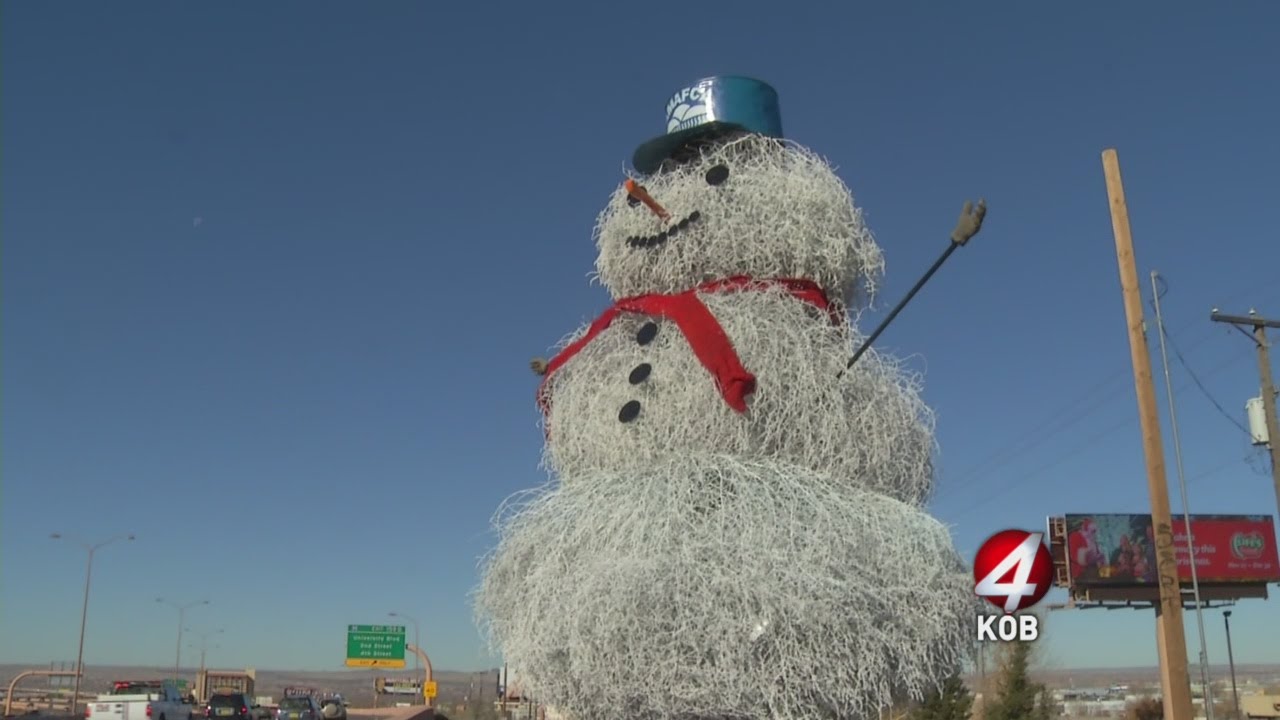 Tumbleweed snowman goes up along I-40 - YouTube