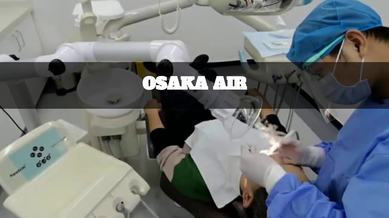 Extraoral Suction Unit- Dentist works with aerosol suction system ...