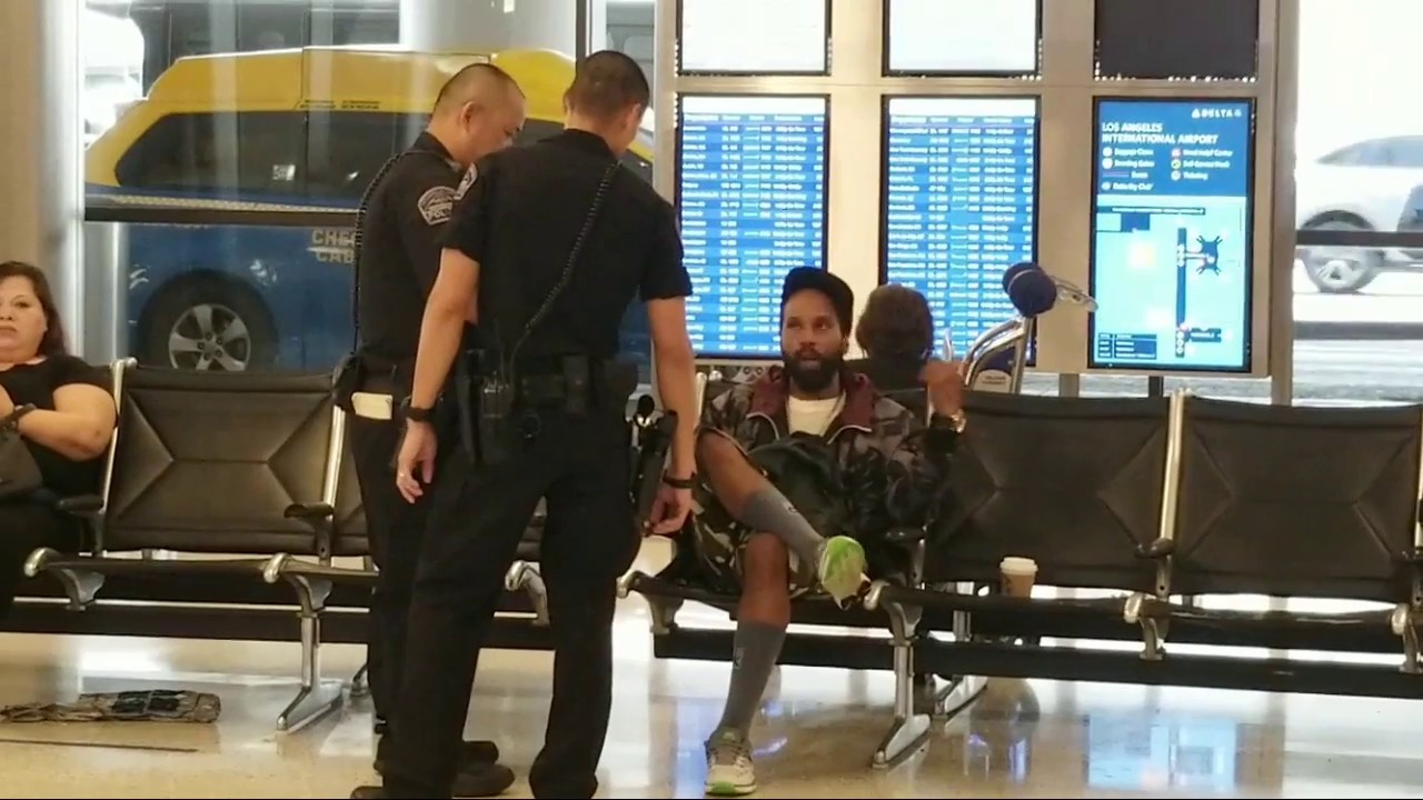 Lax airport police on a 5150 man at lax - YouTube