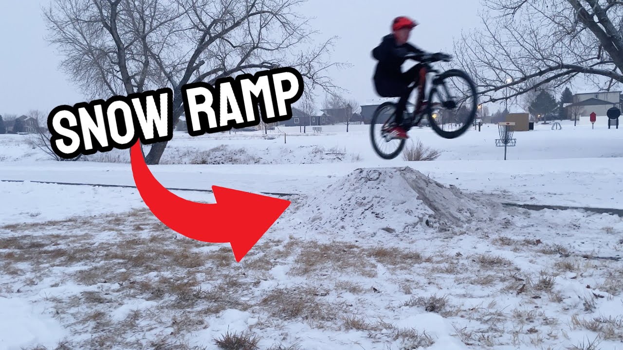 Building a giant snow bike ramp!!! - YouTube