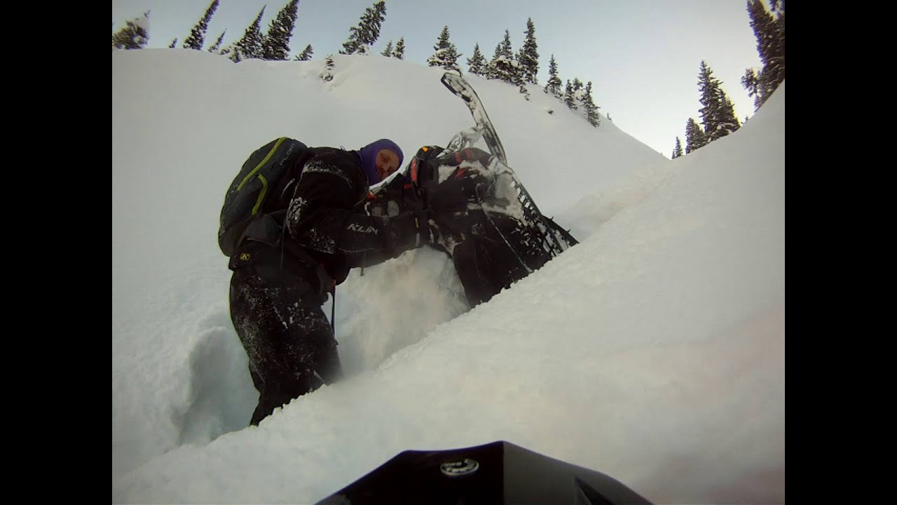Snowmobile stuck - YouTube