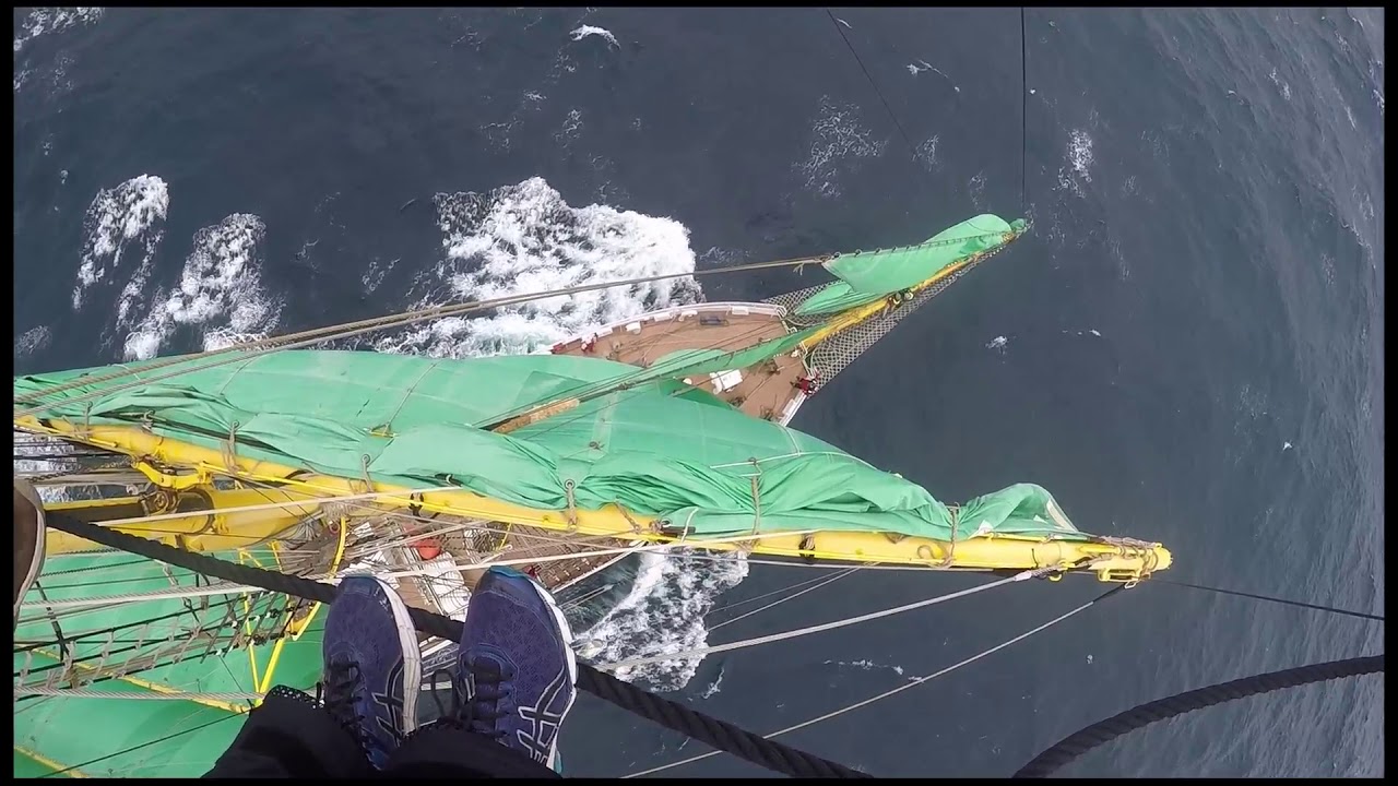 Packing away torn sails - YouTube