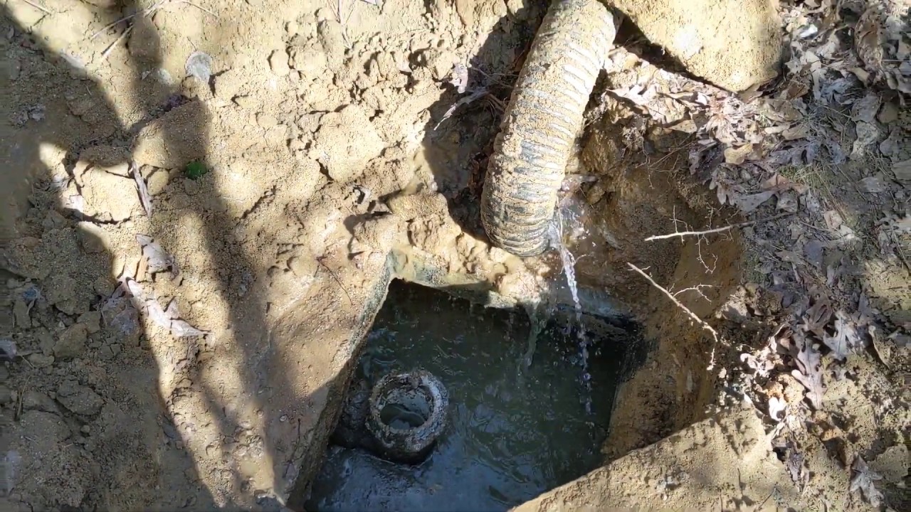 French drain on top of the septic tank. (Not good) - YouTube