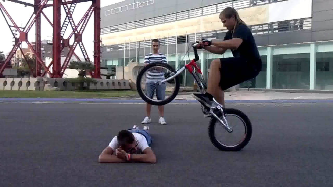 Jumping over a person - YouTube