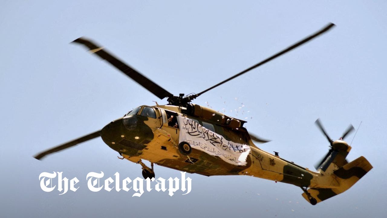 Taliban fly US Black Hawk helicopter above military parade in Kandahar ...