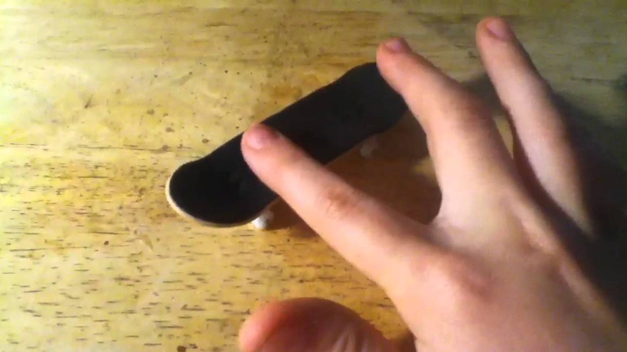 How To Ollie On A Fingerboard - YouTube