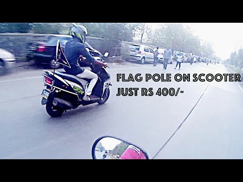Flag pole in scooter - YouTube
