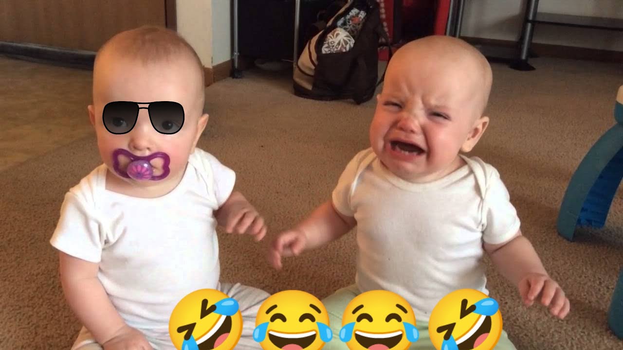 Twin baby girls fight over pacifier very funny fight funny video - YouTube