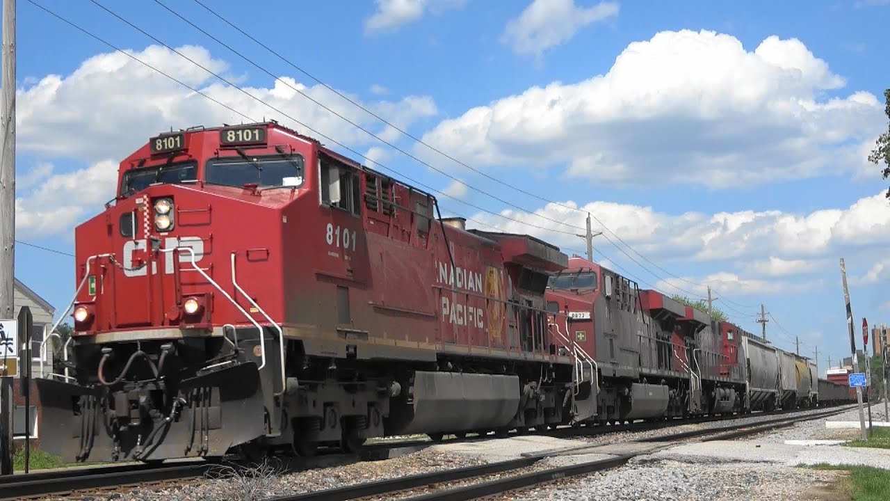 CP 8101 w/ CSX Power Leads Freight, Buffalo, IA - YouTube