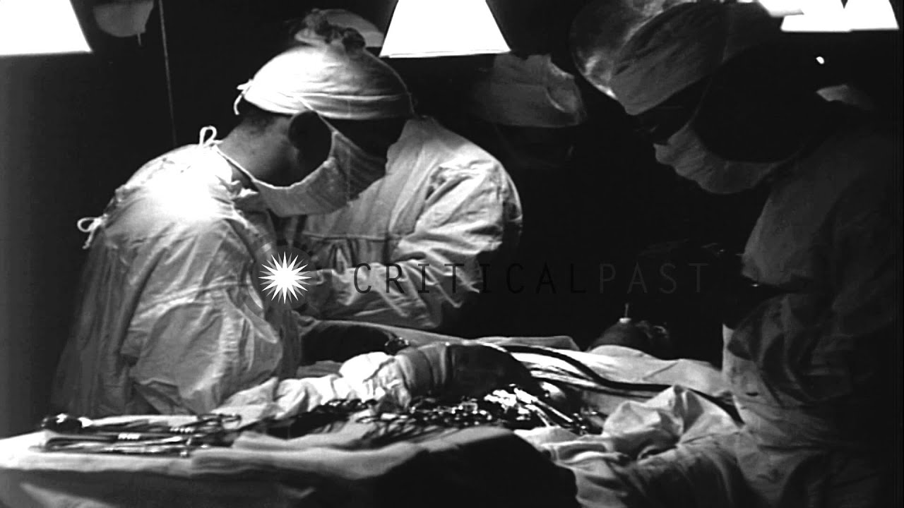 Doctors perform an operation in France during World War 2 HD Stock ...