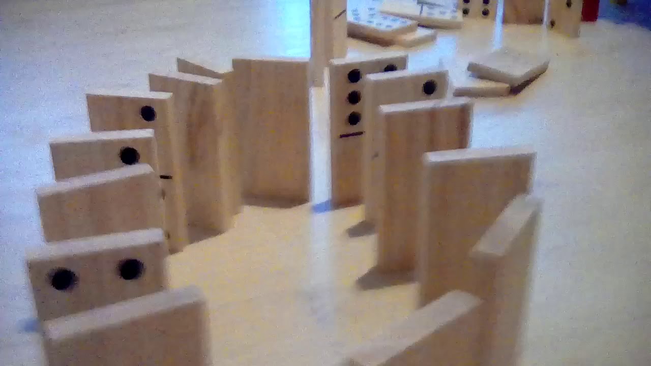 Falling dominoes - YouTube