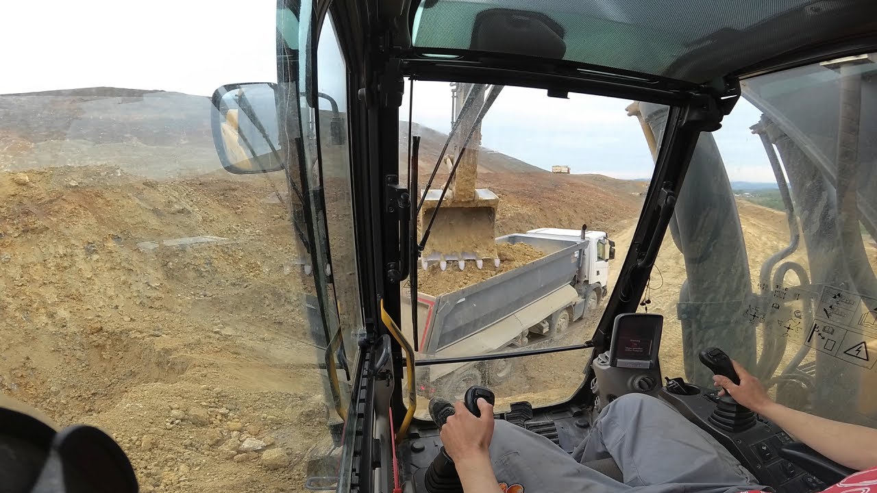 Excavator Volvo EC380D loads trucks #15 - YouTube