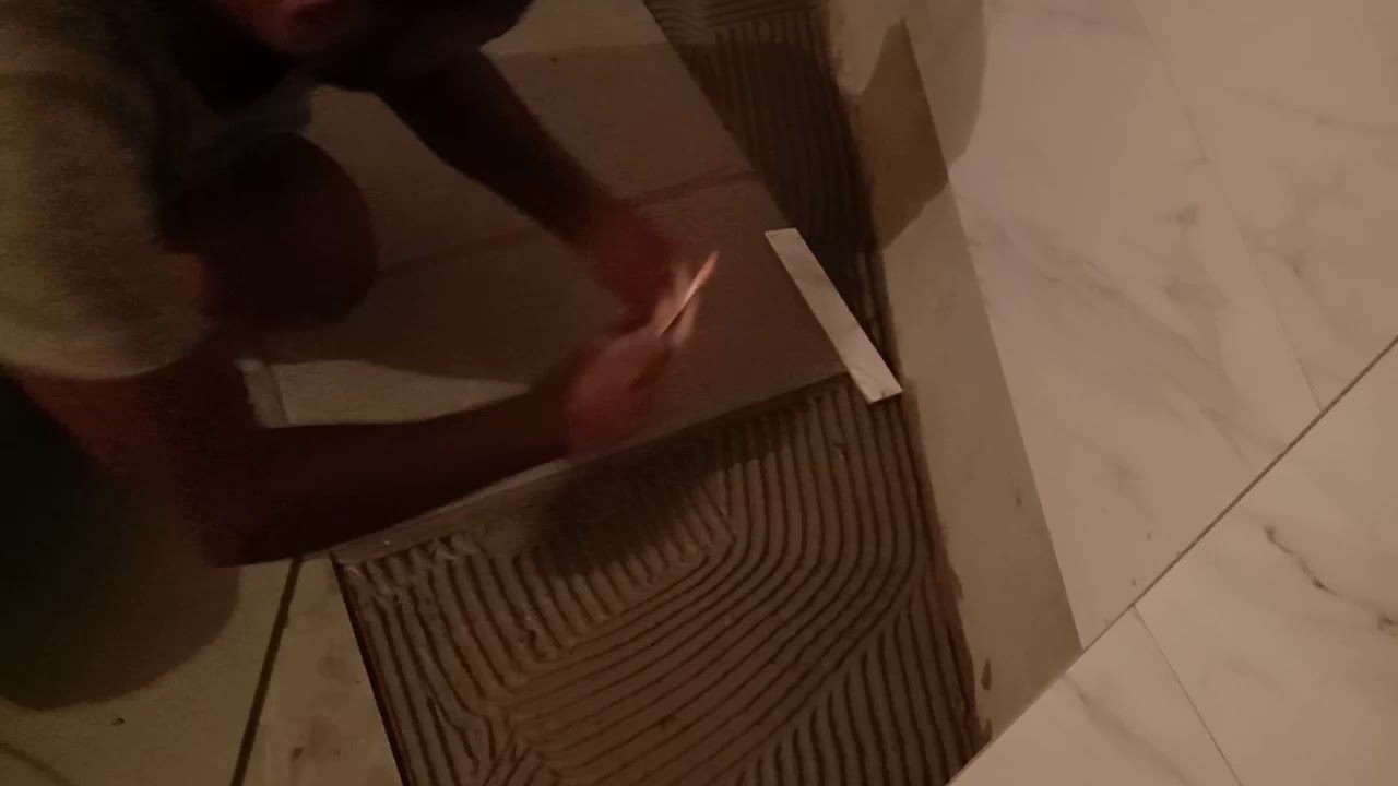 Tile fixing with adhesive - YouTube