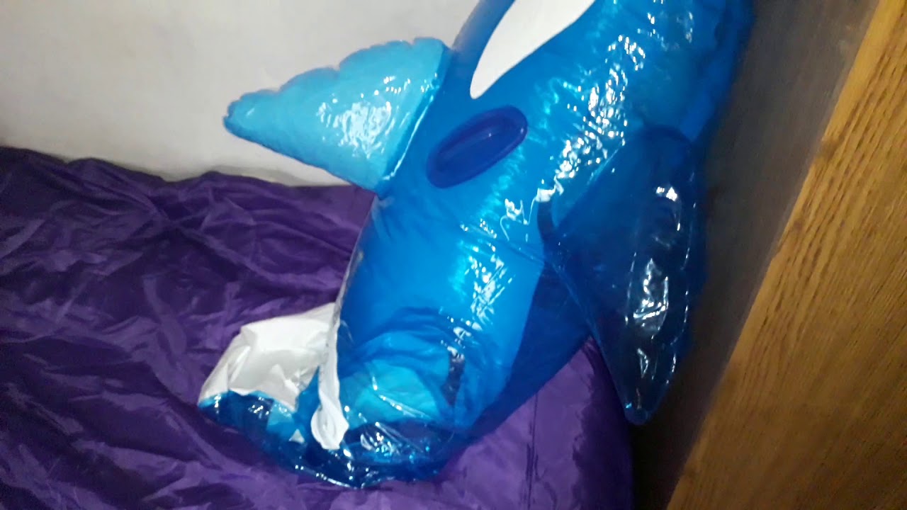 Blue dolphin deflating - YouTube