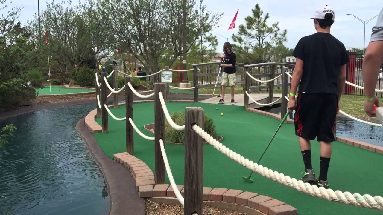 Having fun playing Putt Putt golf (mini golf) - YouTube