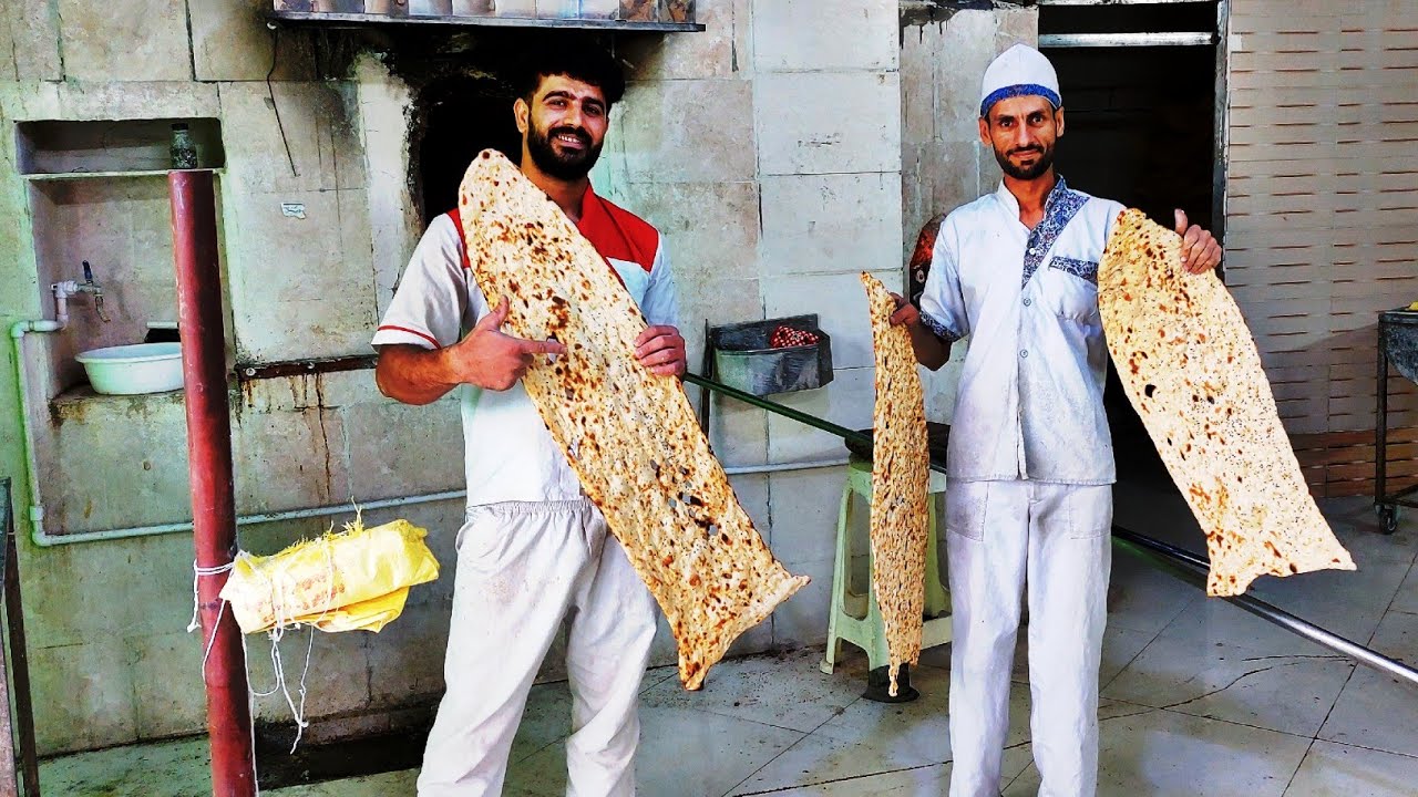 Cooking different types of Sangak bread in the bakery: Iranian Sangak ...