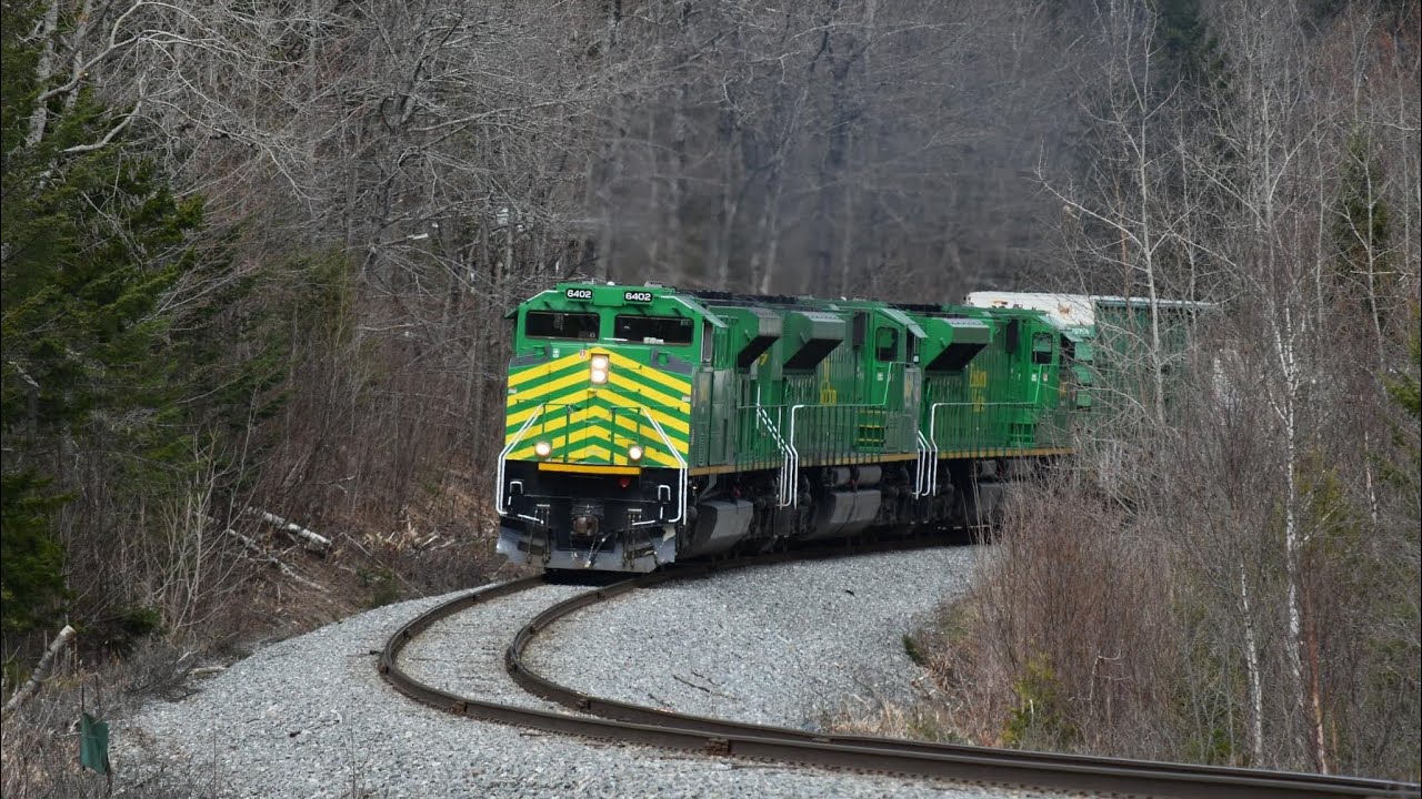 Trio of SD70M-2s power NBSR 120 Round the Curve into Grand Bay, NB ...