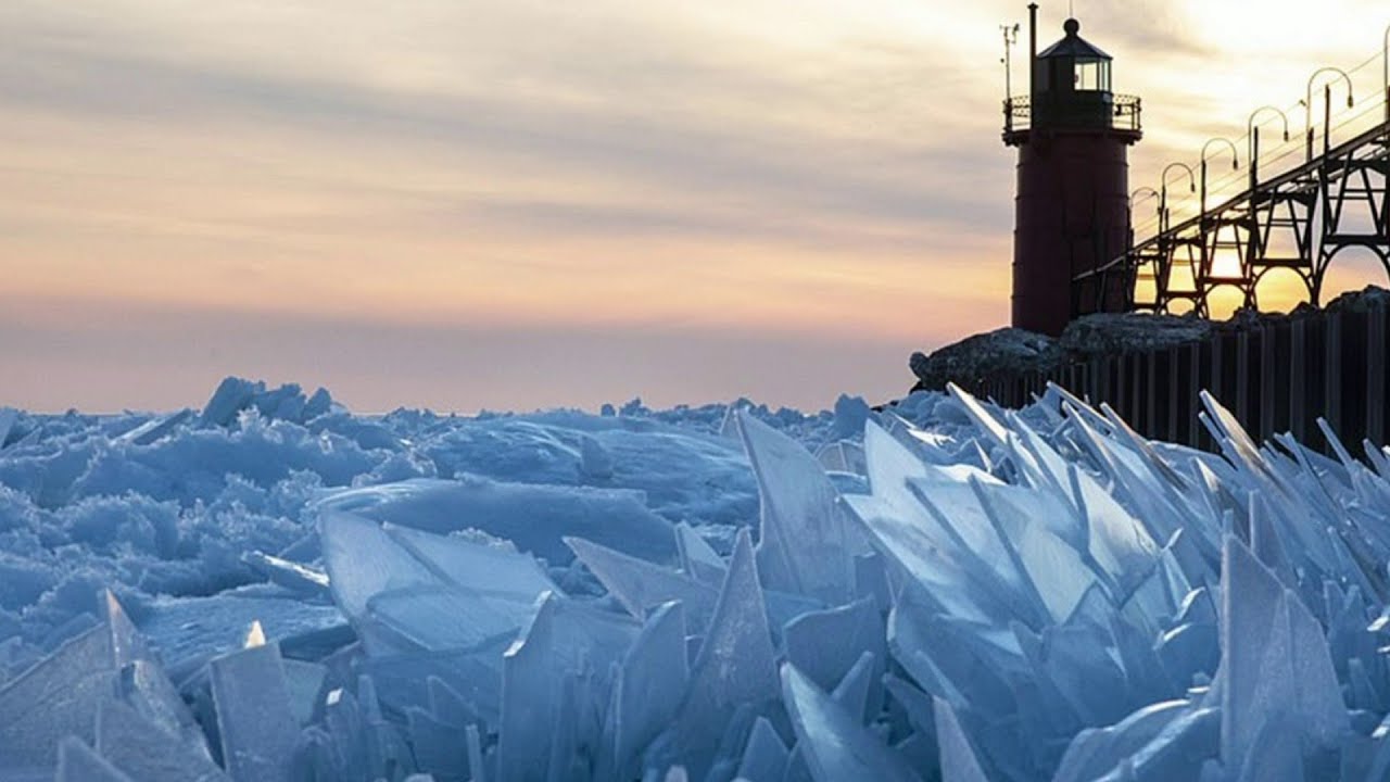 Beautiful ice sheets form on Lake Michigan shore - YouTube