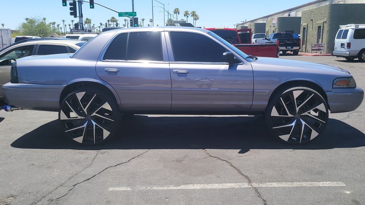 Crown Victoria Sport Sitting On 28 Inch Black Ghost Lexani. - YouTube