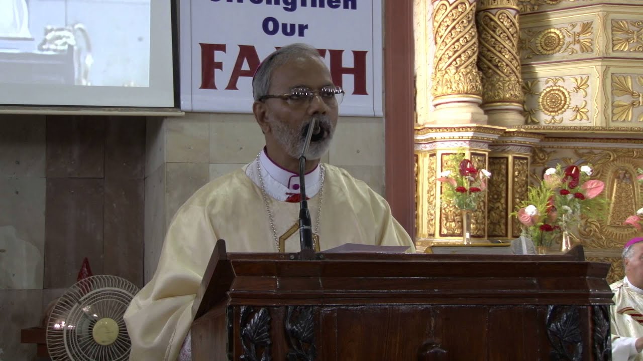 Bishop Dominic Savio Fernandes reads a letter of sent by Pope Francis ...